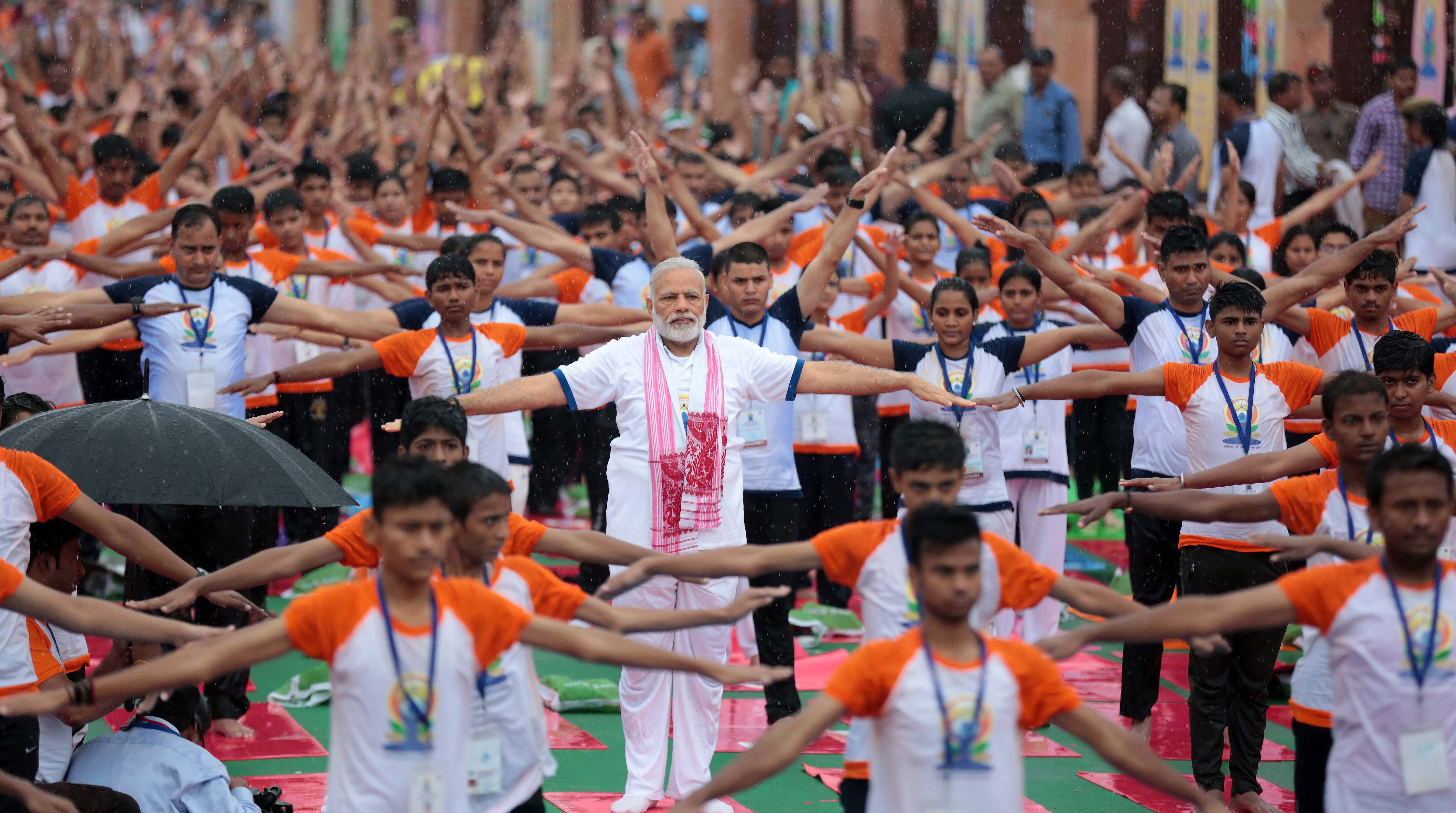 International Yoga Day 2017: PM Modi does 'asanas' amid showers