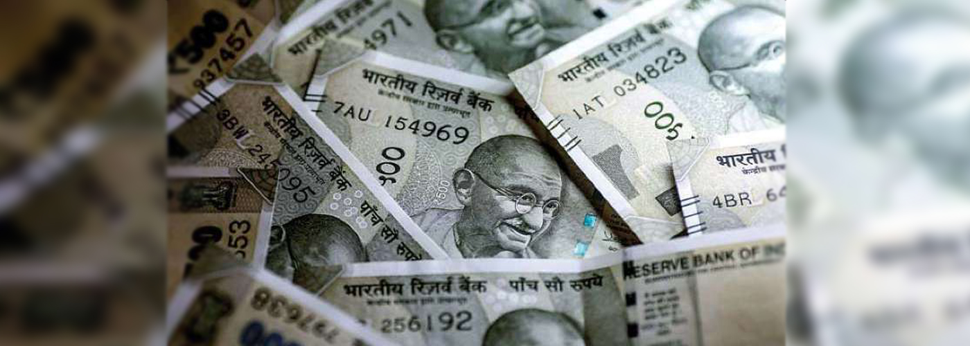 Rupee devalues to record low near 70.20
