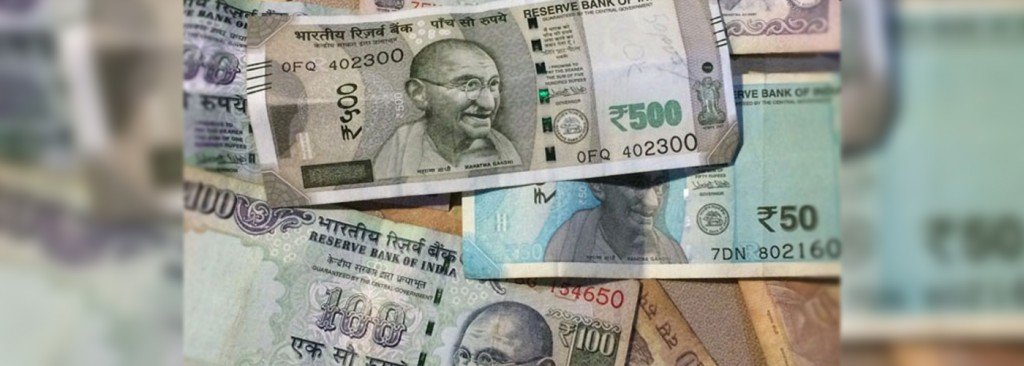 Rupee falls to fresh low of 71.37 per dollar